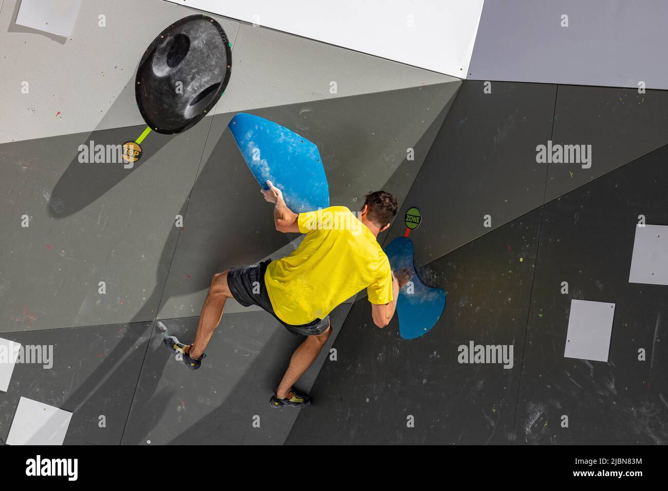 Climbing. Sport. Young person climbing in Block Climbing. Olympic ...