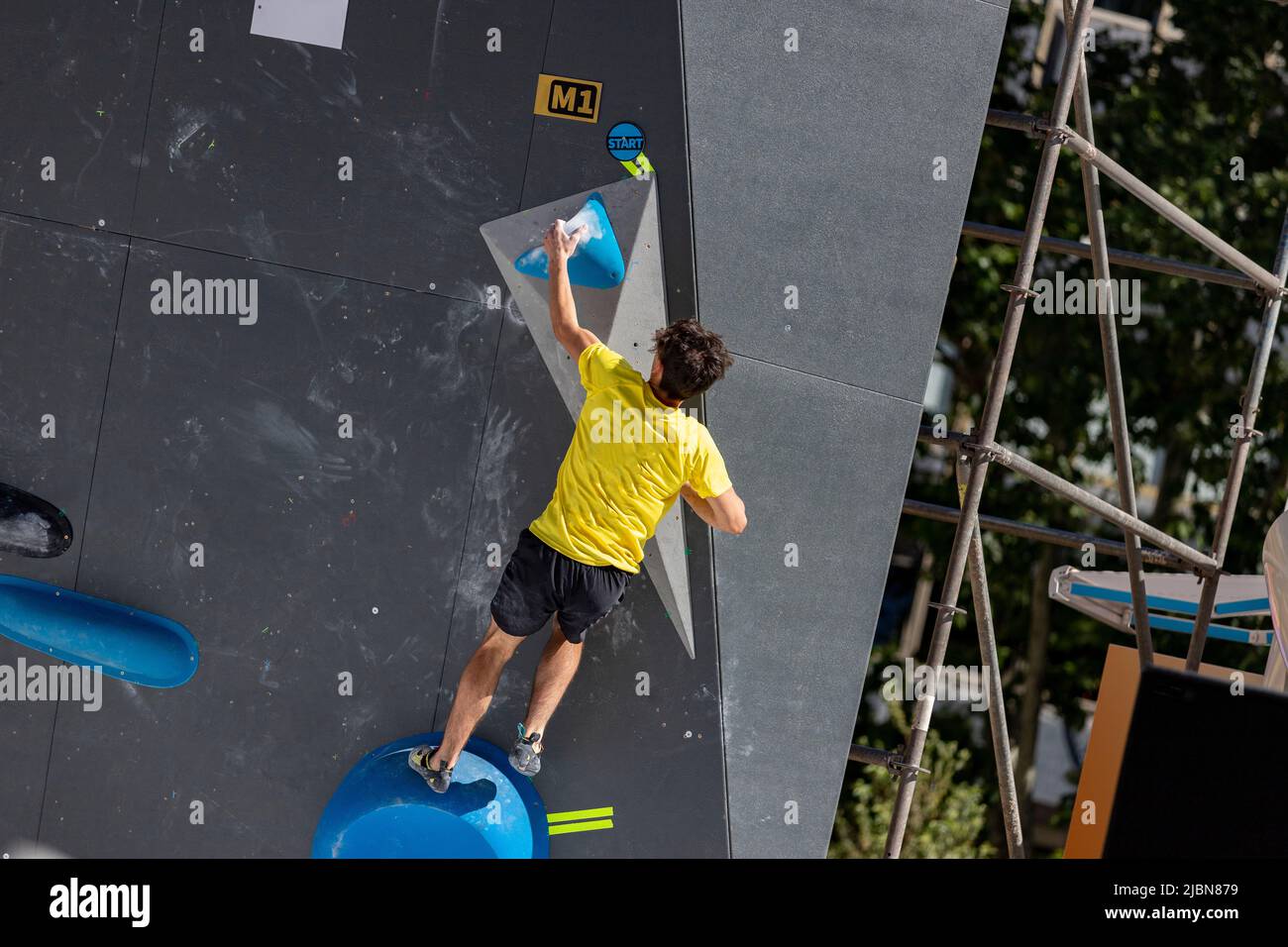 Climbing. Sport. Young person climbing in Block Climbing. Olympic ...