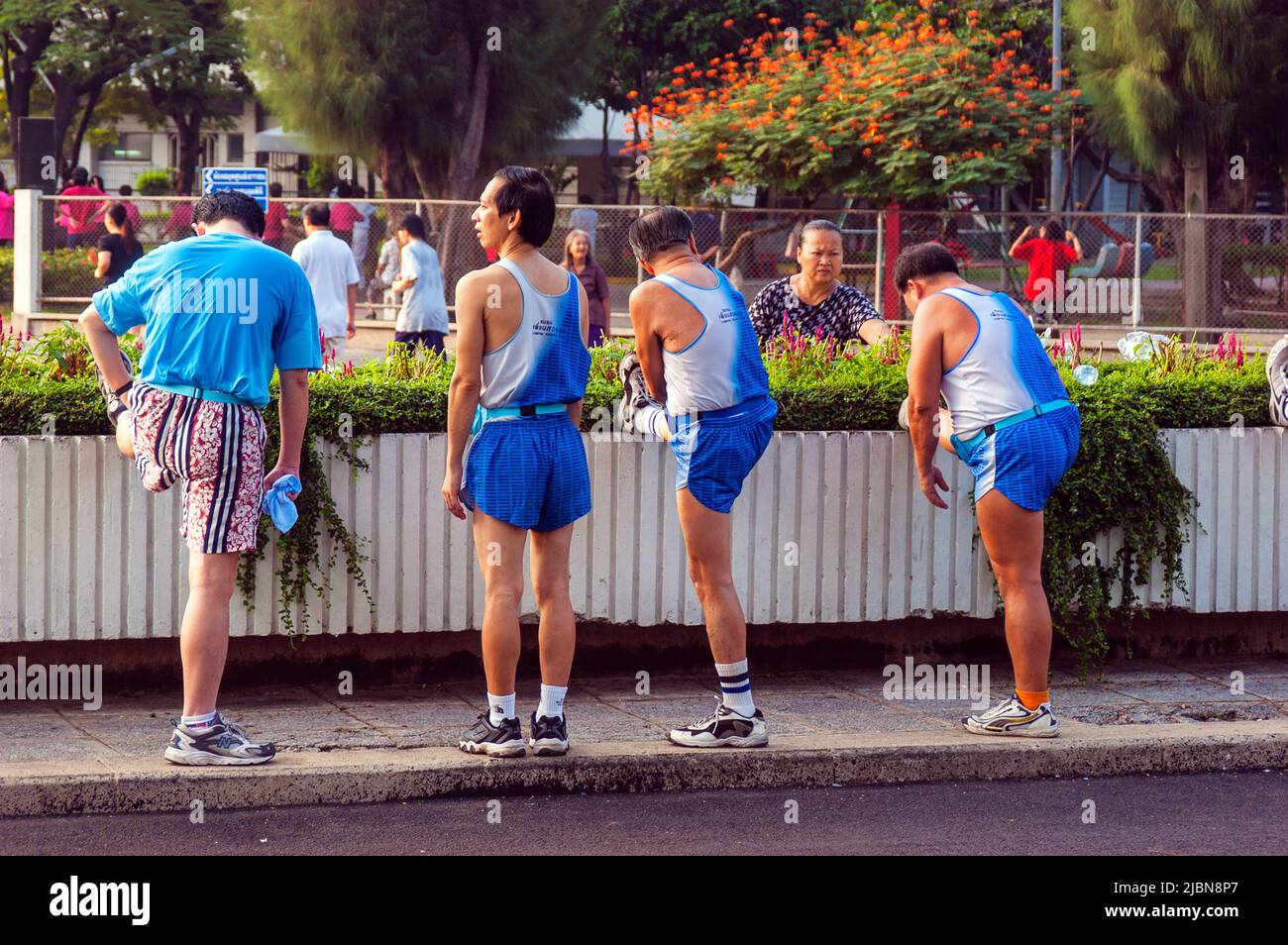 Morning walking and stretching exercise for seniors in Lumpini park ...