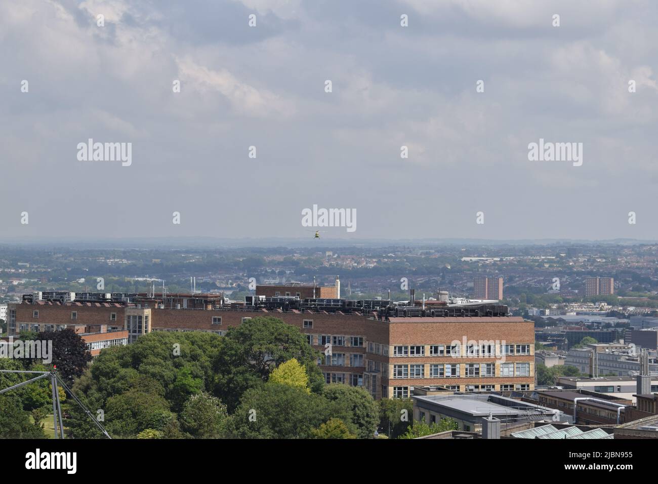 Aerial view of Bristol city during sunny day with sky and clouds. Many ...