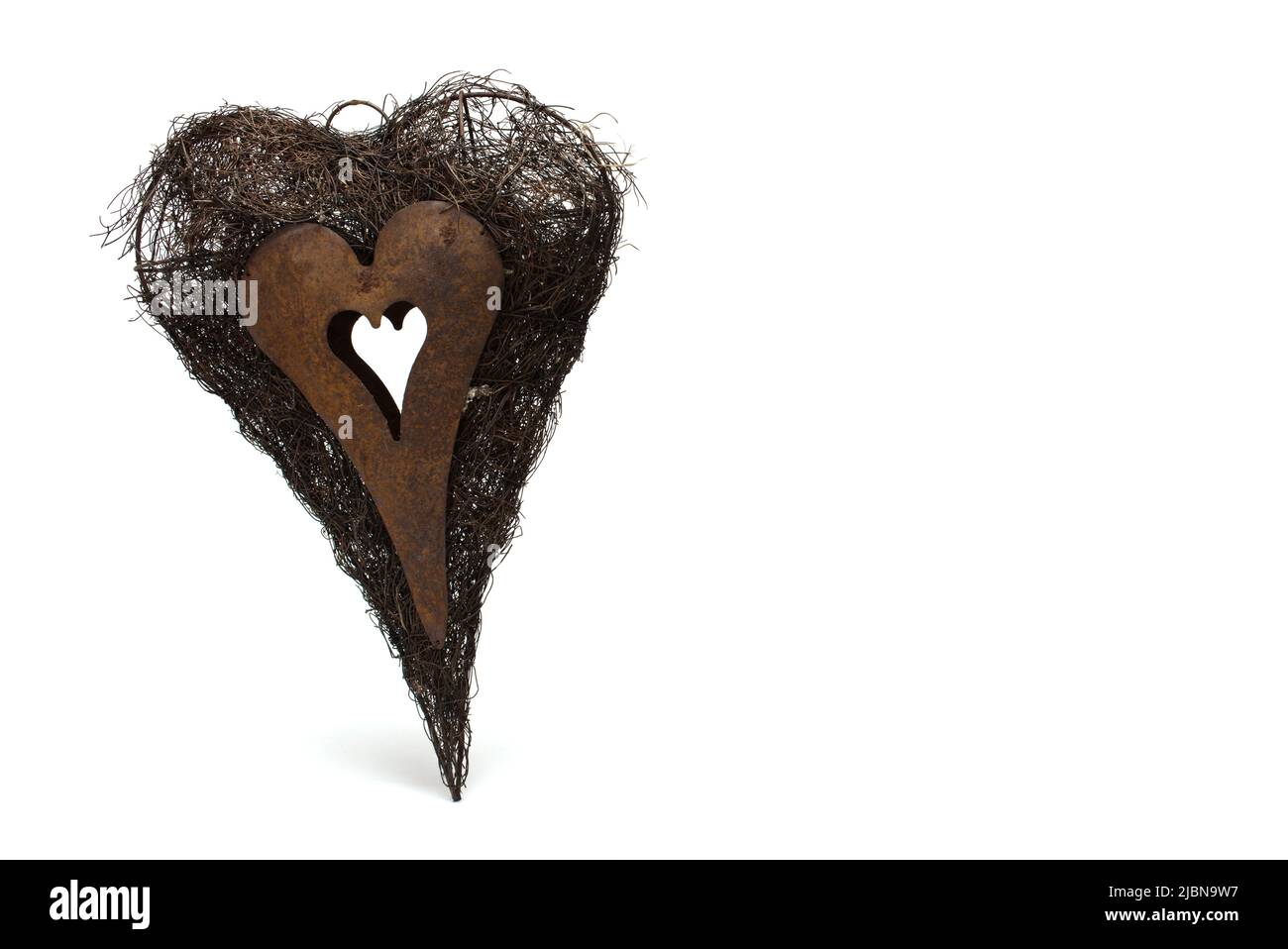 Close up of rustic retro vintage three dimensional heart made of rusty ...