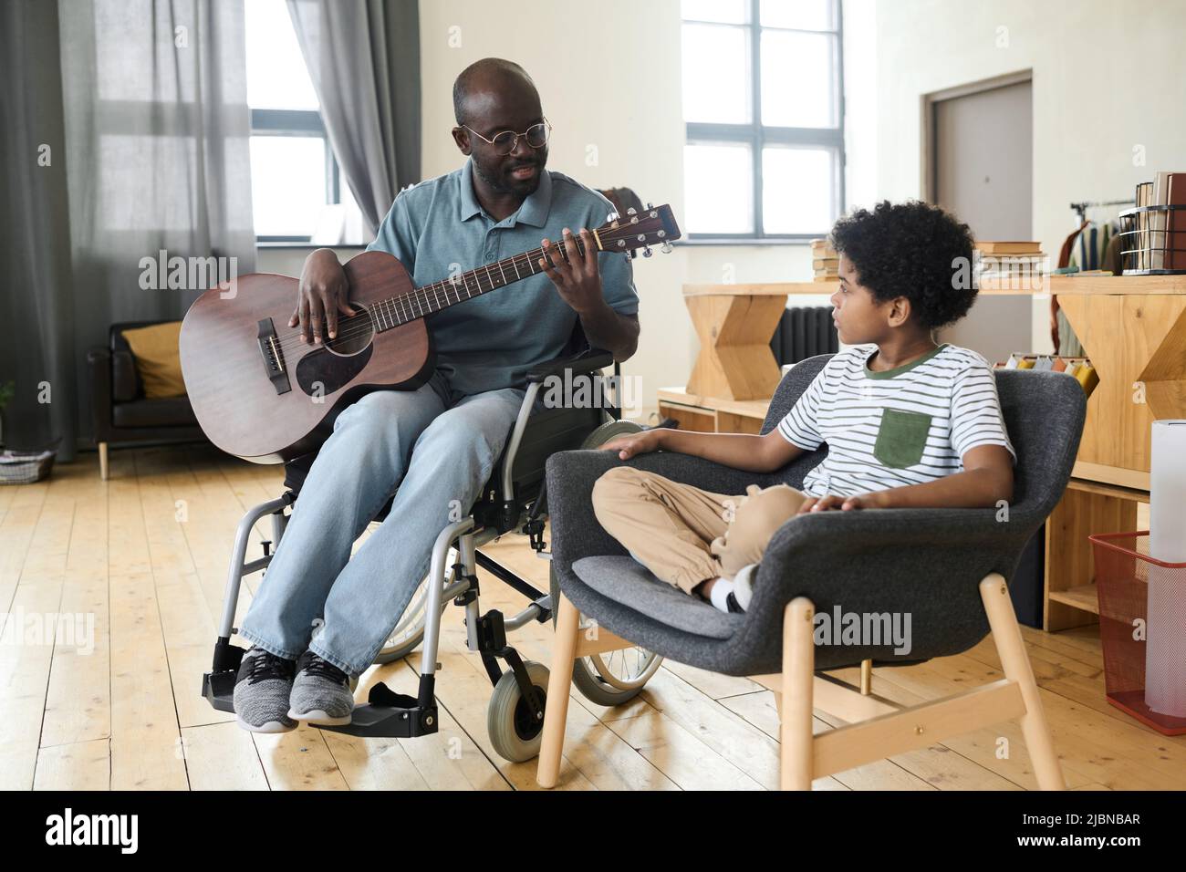 Musician on wheelchair hi-res stock photography and images - Alamy