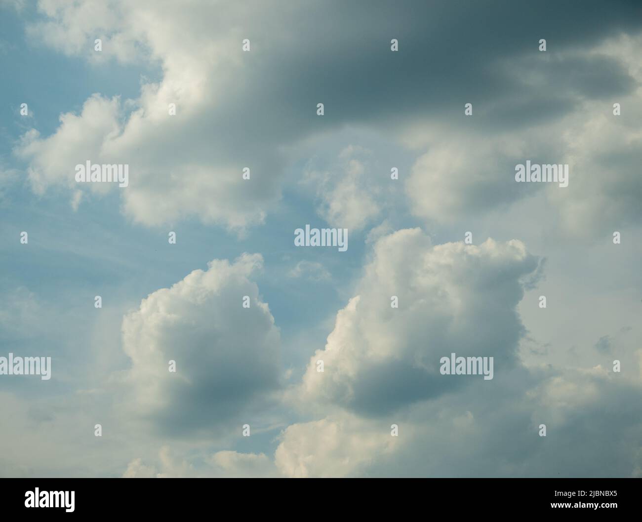 White clouds in the blue sky. Clouds float across the sky Stock Photo ...