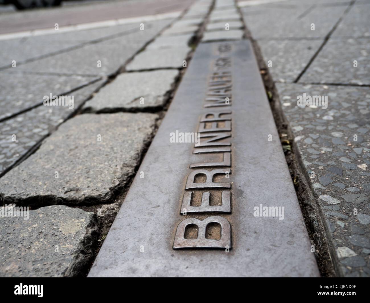 Berlin wall sign on the street, Berliner Mauer Stock Photo - Alamy