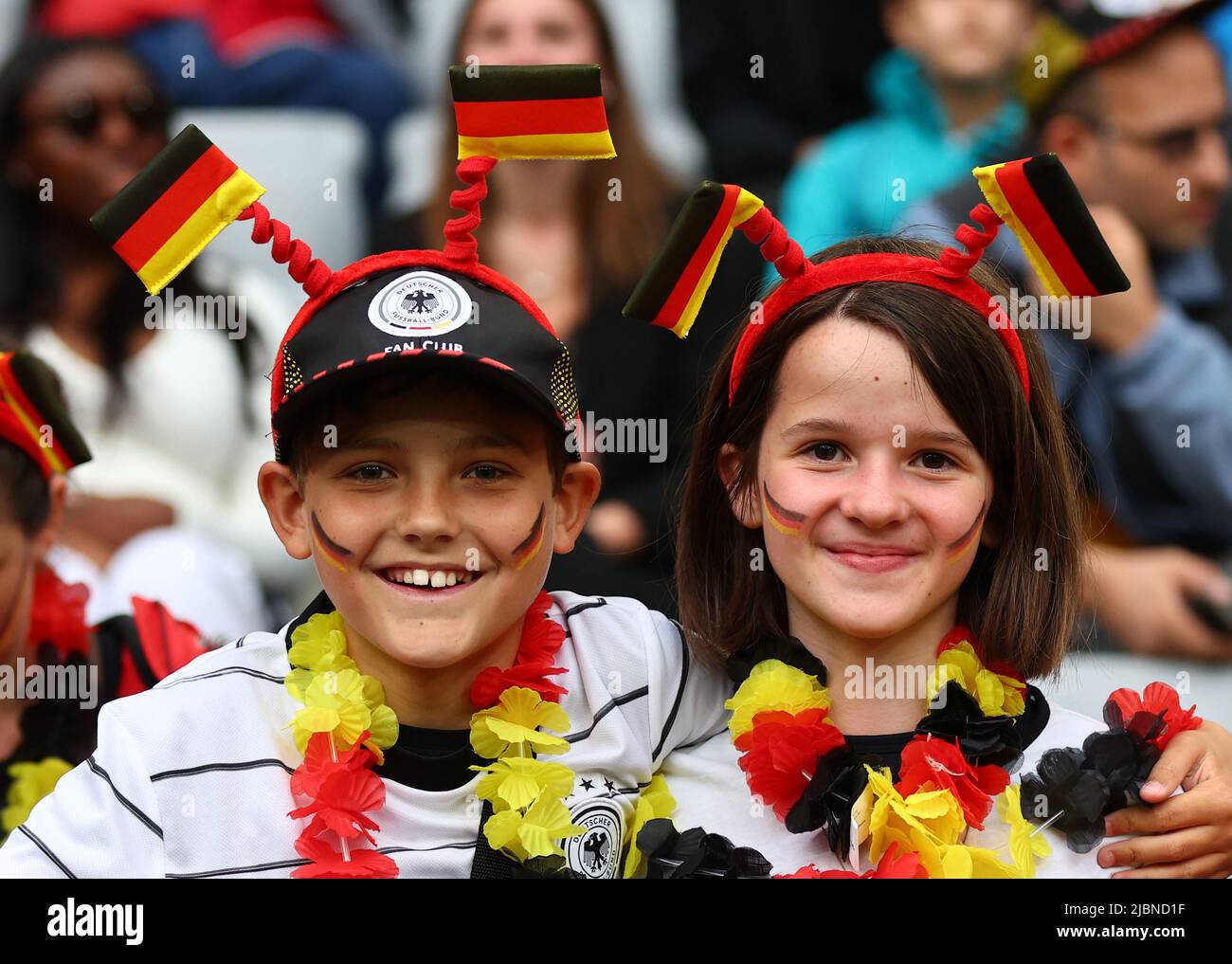 Munich, Germany, 7th June 2022. Young German fans pose for a picture ...