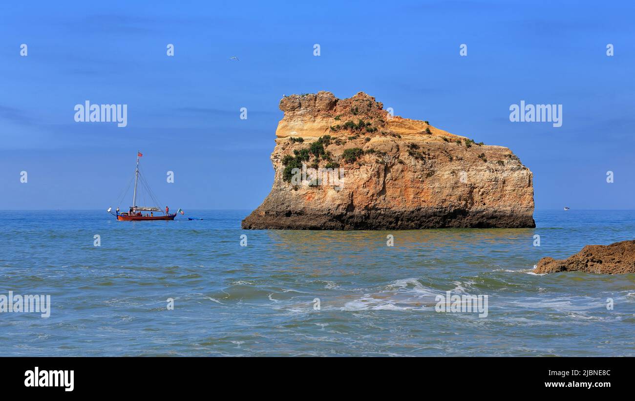 Tourist sailboat off the Praia da Prainha Beach. Alvor Portimao ...