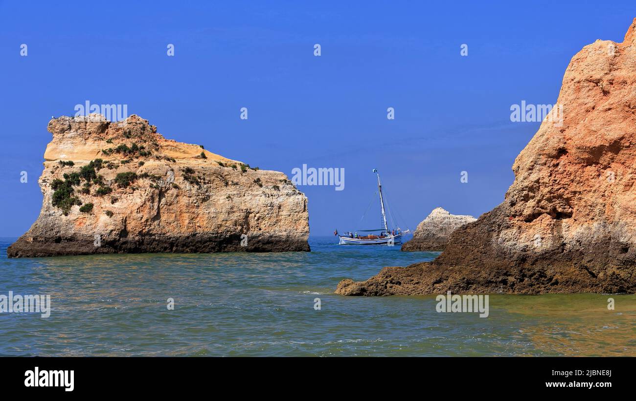Tourist sailboat off the Praia da Prainha Beach. Alvor Portimao ...