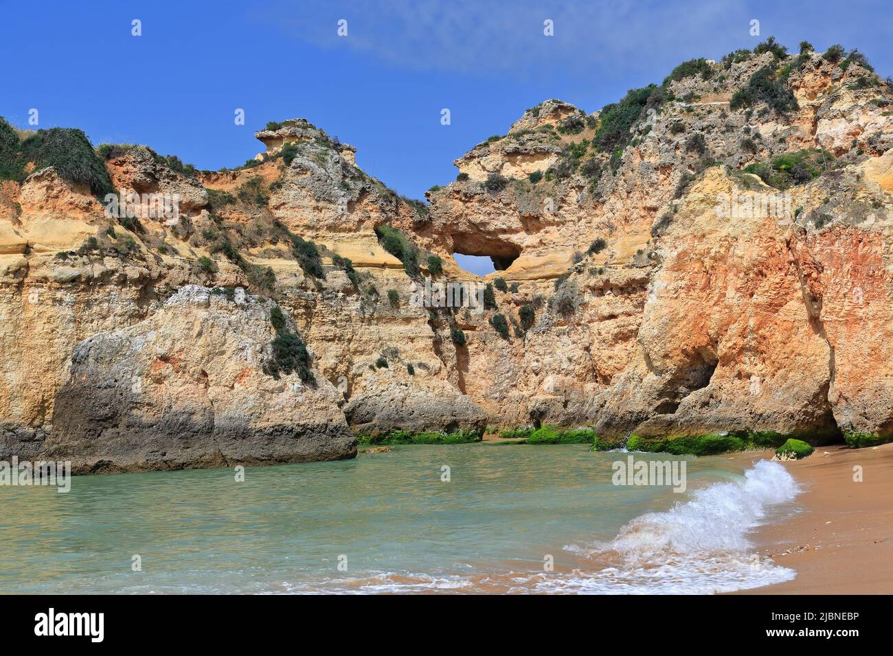 Seastack and cliffs at the westernmost end-Praia da Prainha Beach ...