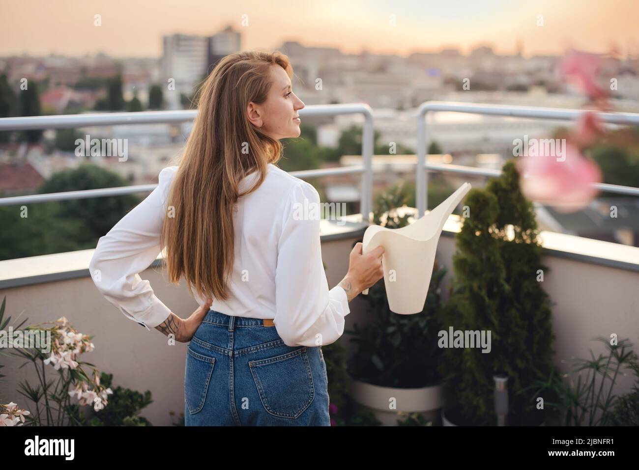 Beautiful young woman pours hi-res stock photography and images - Alamy