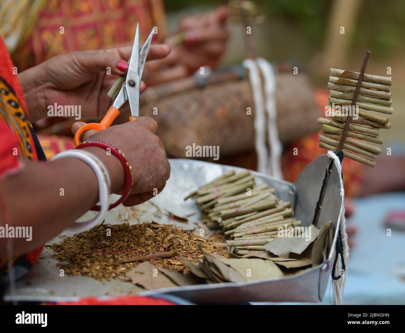 Workers make beedis or leaf-made cigarettes at their workplace on World ...