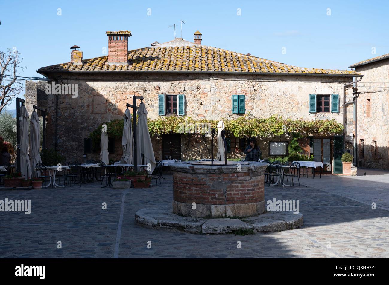 Houses inside old town walls in medieval fortress town on hilltop ...