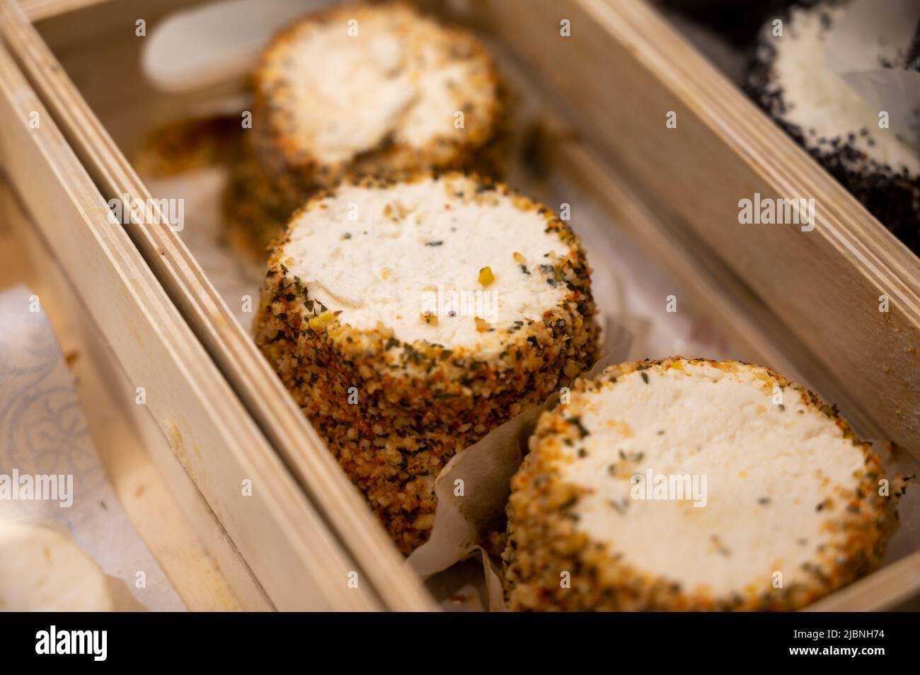 Variety of French soft goat cheese with different toppings, indian ...