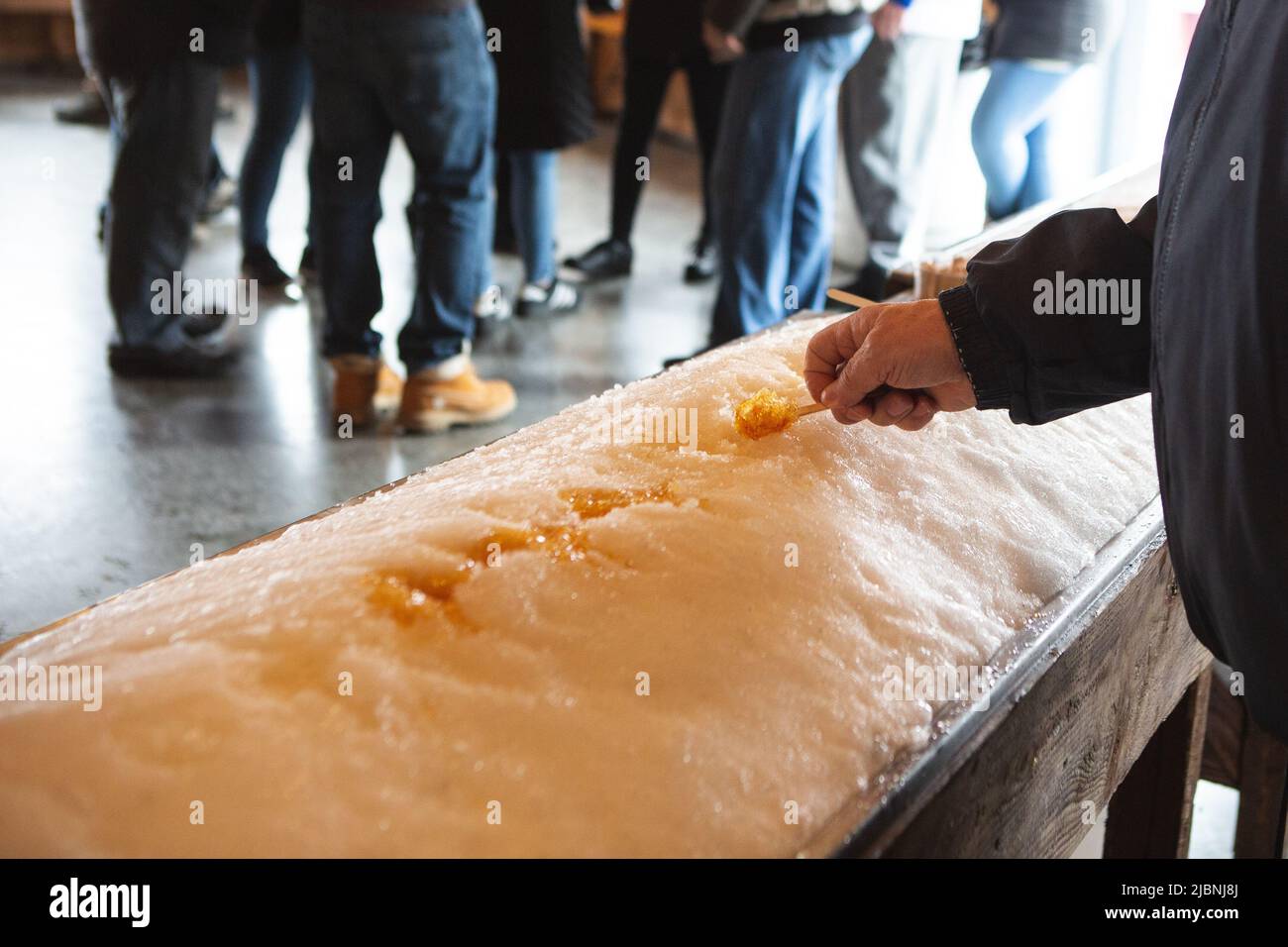 Maple taffy on snow hi-res stock photography and images - Alamy