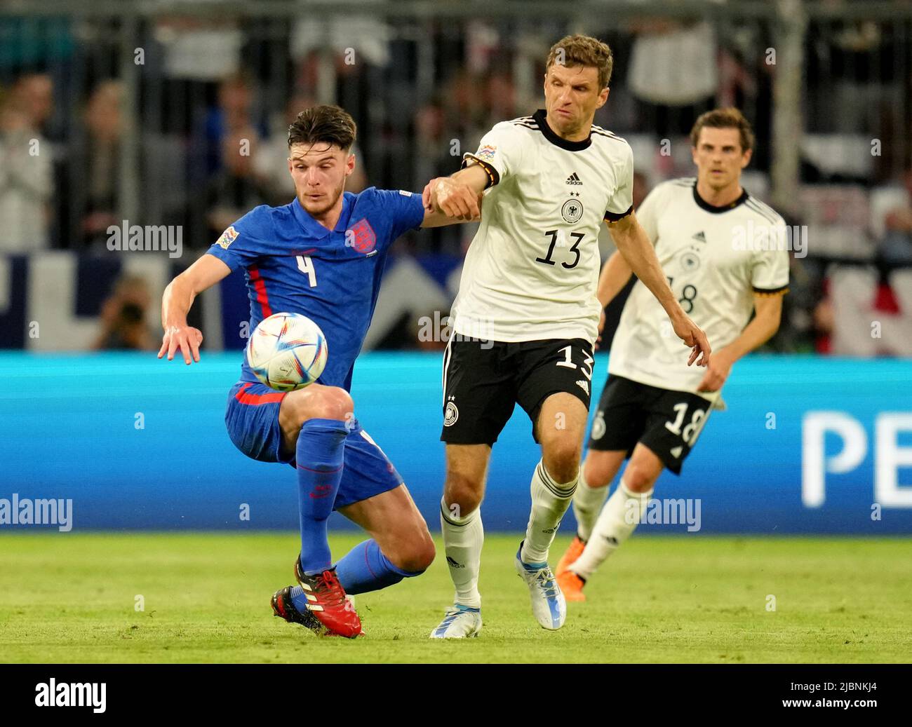 England's Declan Rice (left) and Germany's Thomas Muller battle for the ...