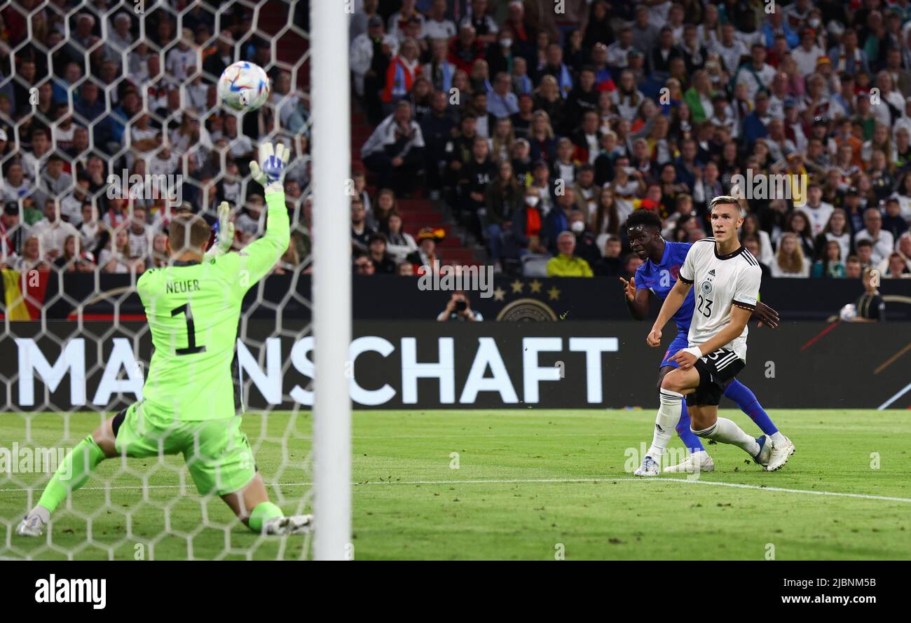 Munich, Germany, 7th June 2022. Bukayo Saka of England takes shot which ...