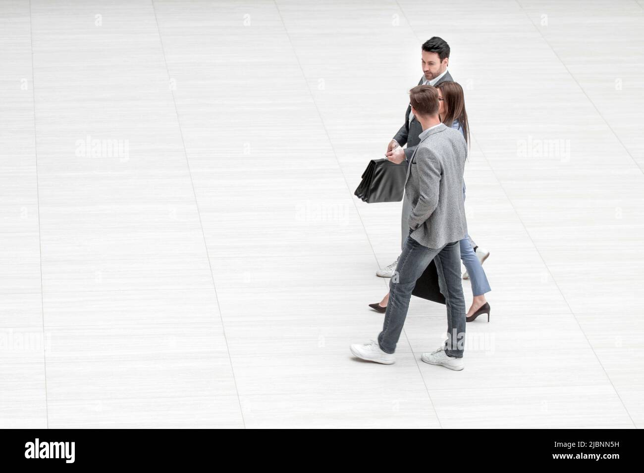 top view, business colleagues walking together Stock Photo - Alamy