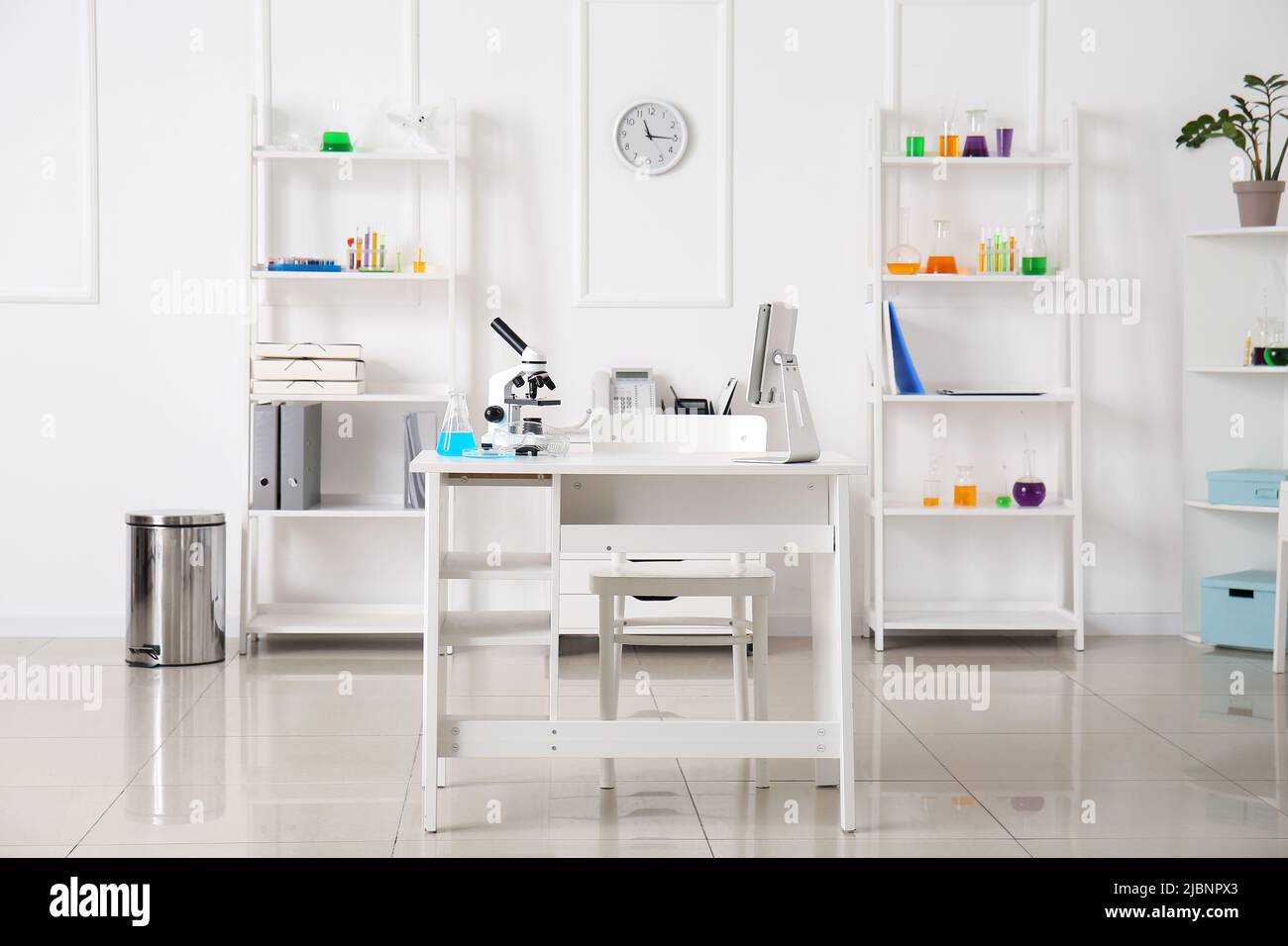 Interior of medical laboratory with modern workplace, microscope ...