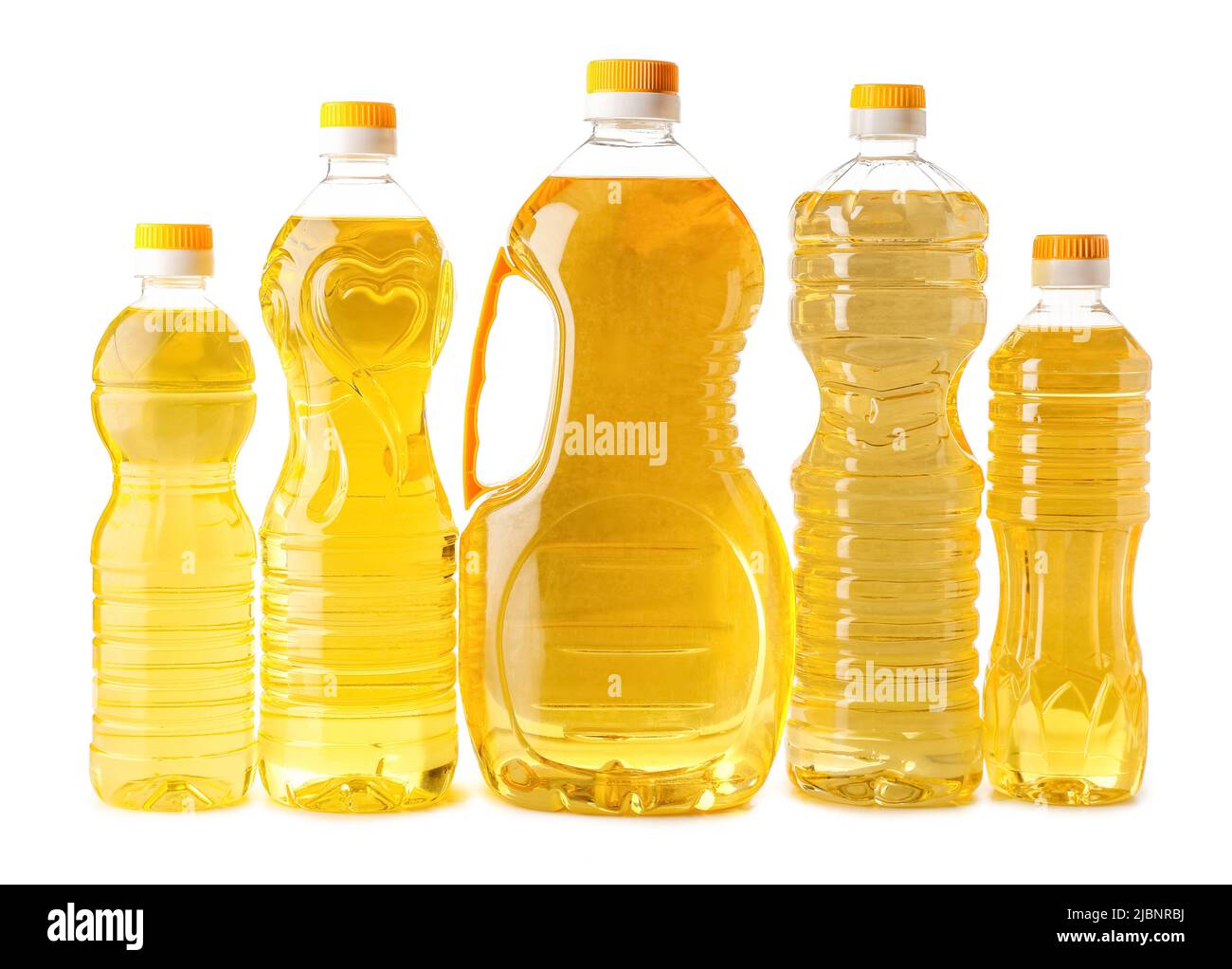 Different bottles of fresh sunflower oil on white background Stock ...