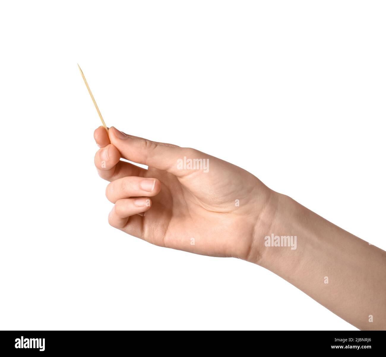 Woman holding bamboo toothpick on white background Stock Photo - Alamy