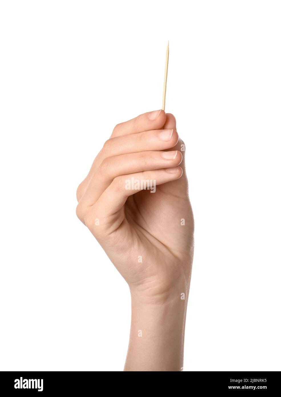 Woman holding bamboo toothpick on white background Stock Photo - Alamy