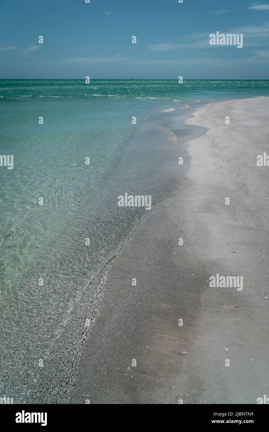 Beach with beautiful blue ocean with copy space and portrait ...