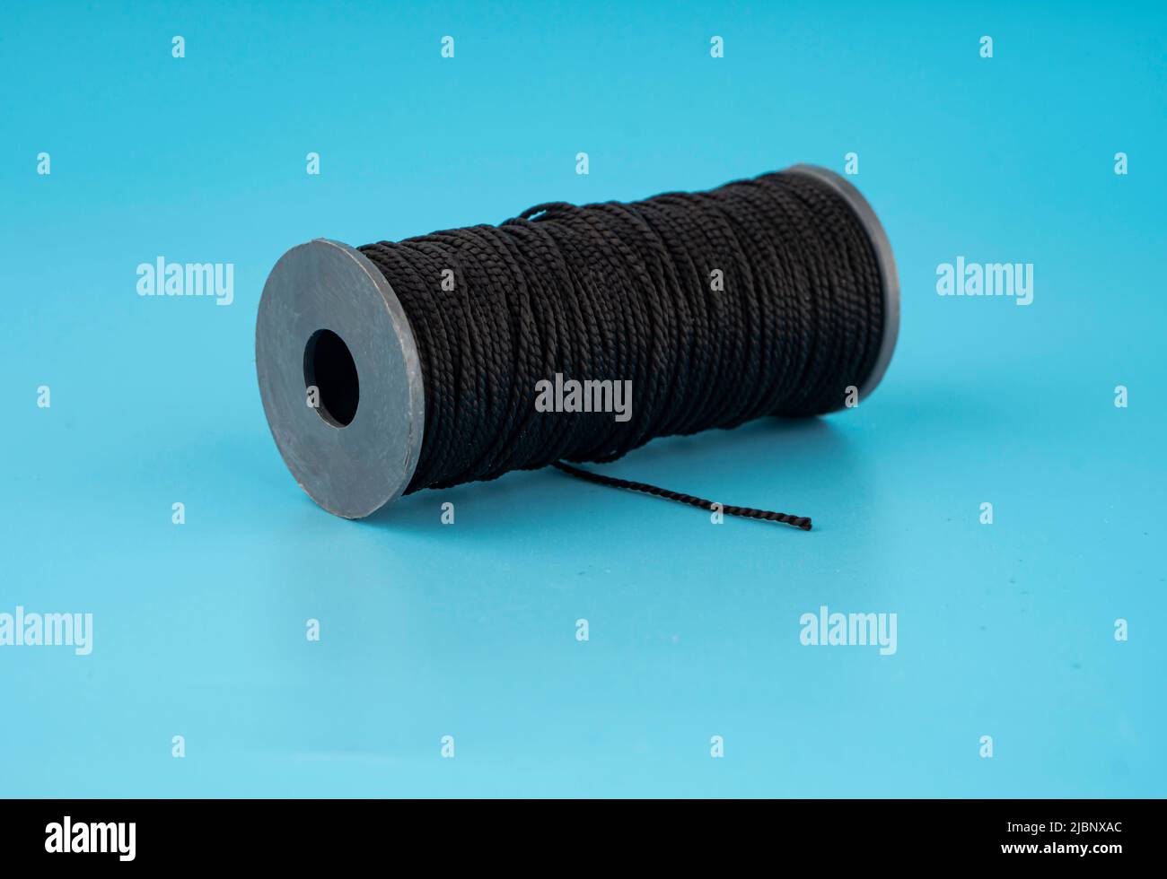 Black white sewing threads hi-res stock photography and images - Alamy