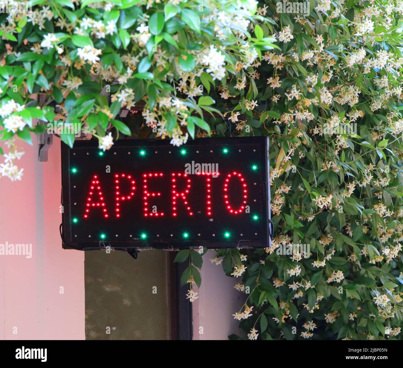 Panel with led and the text APERTO that means OPEN in Italian language ...
