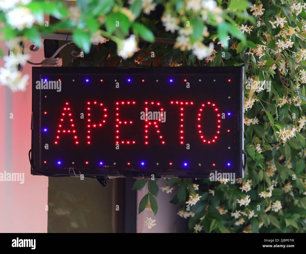 Panel led and the text APERTO that means OPEN in Italian language and ...