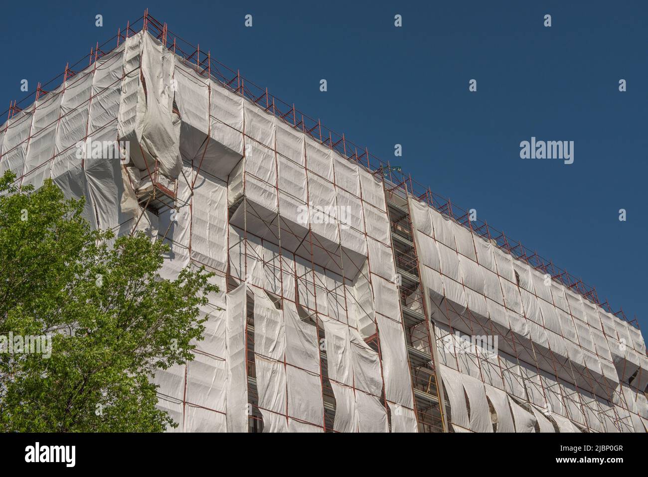 Safety scaffold for building maintenance Stock Photo - Alamy