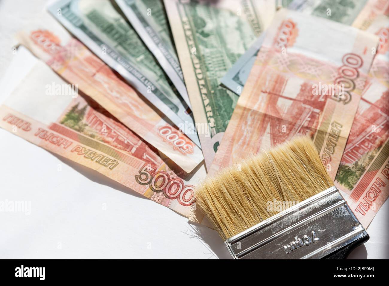 Painting brush - photo on money bank notes. Used painting brush is ...