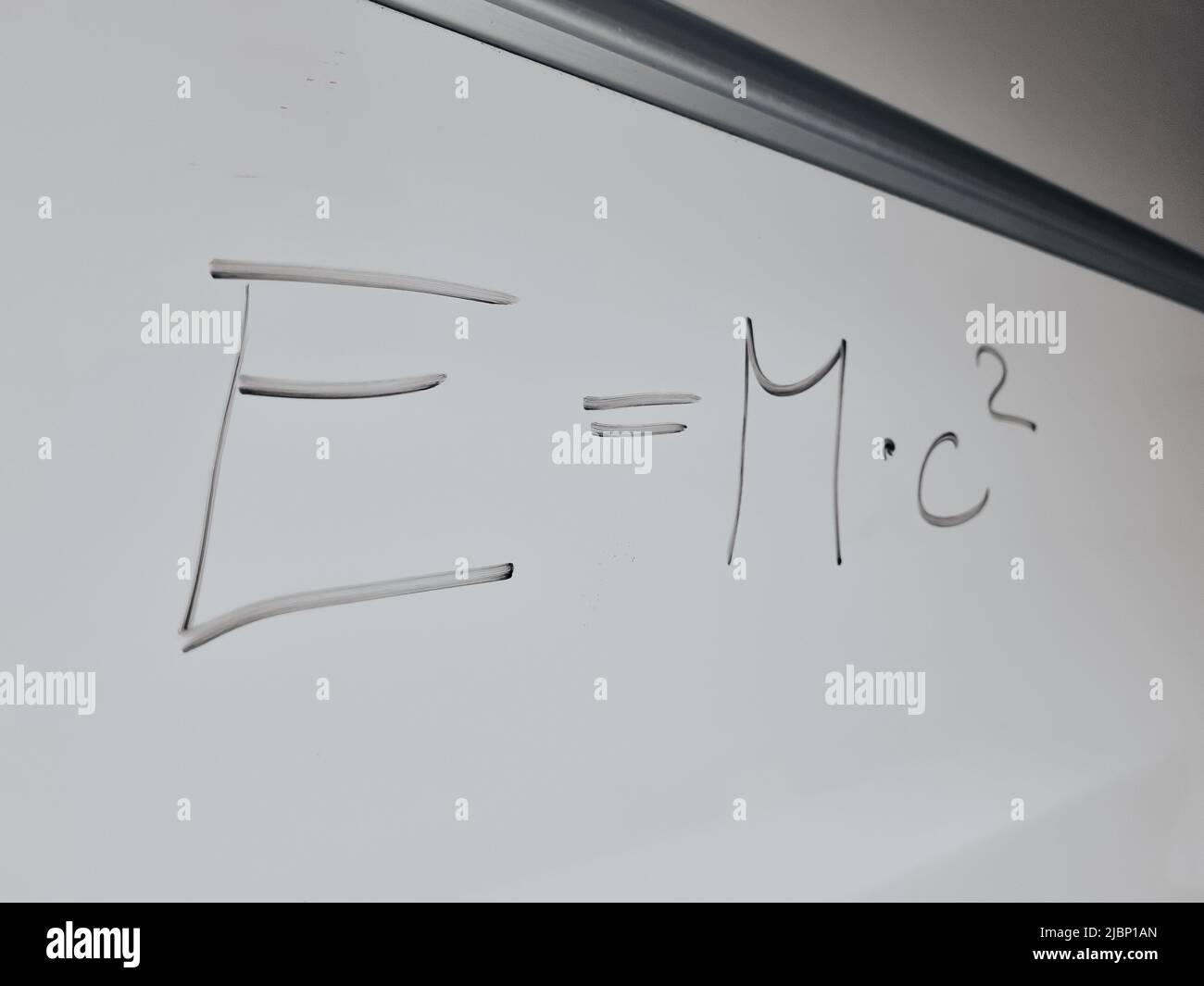 mathematical symbols of an equation from a mathematics lecture on a ...