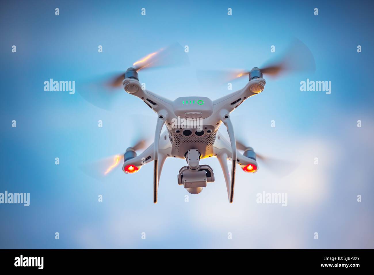Flying drone in the sky Stock Photo - Alamy