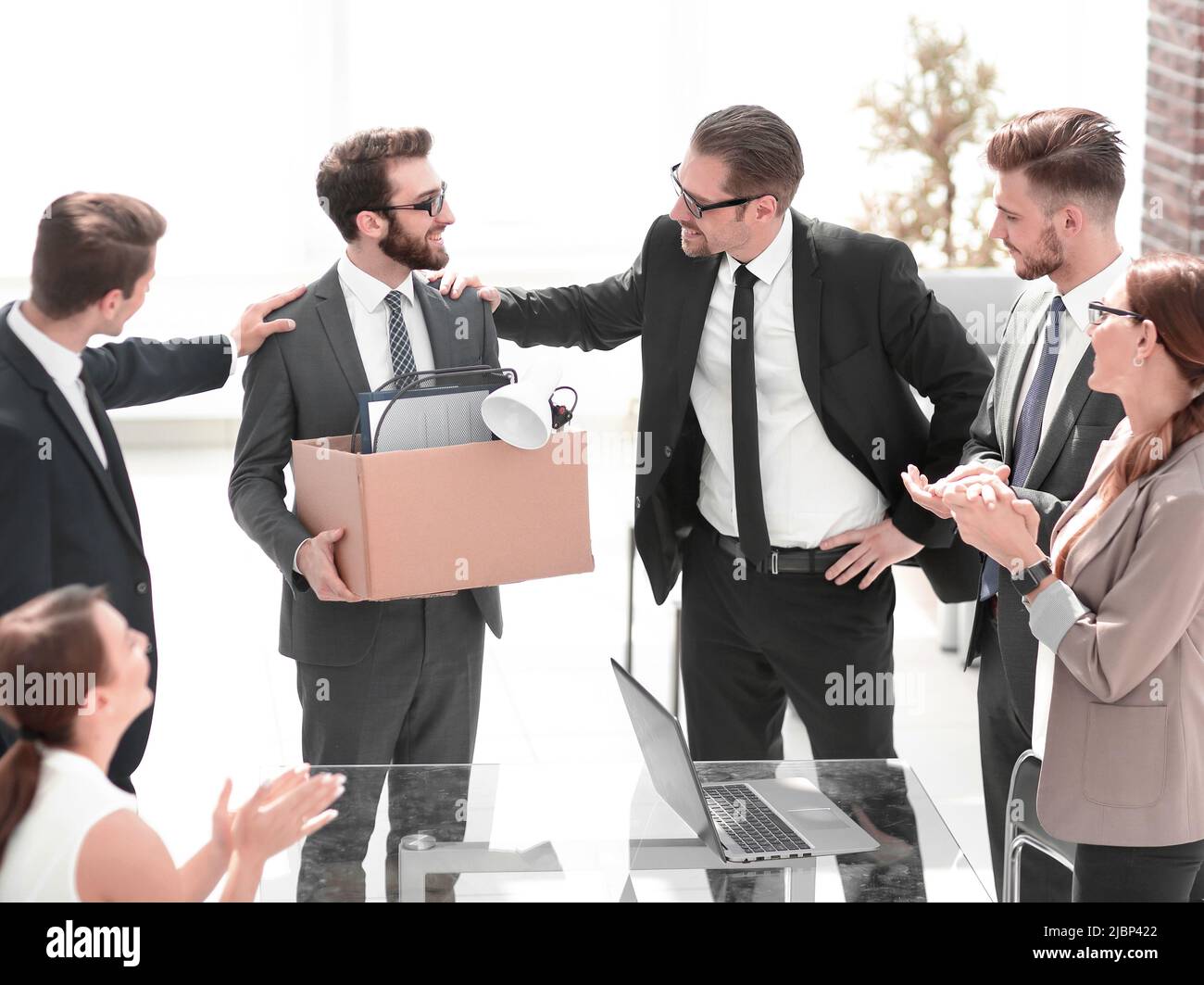 HR Manager introduces a new employee to the business team Stock Photo ...
