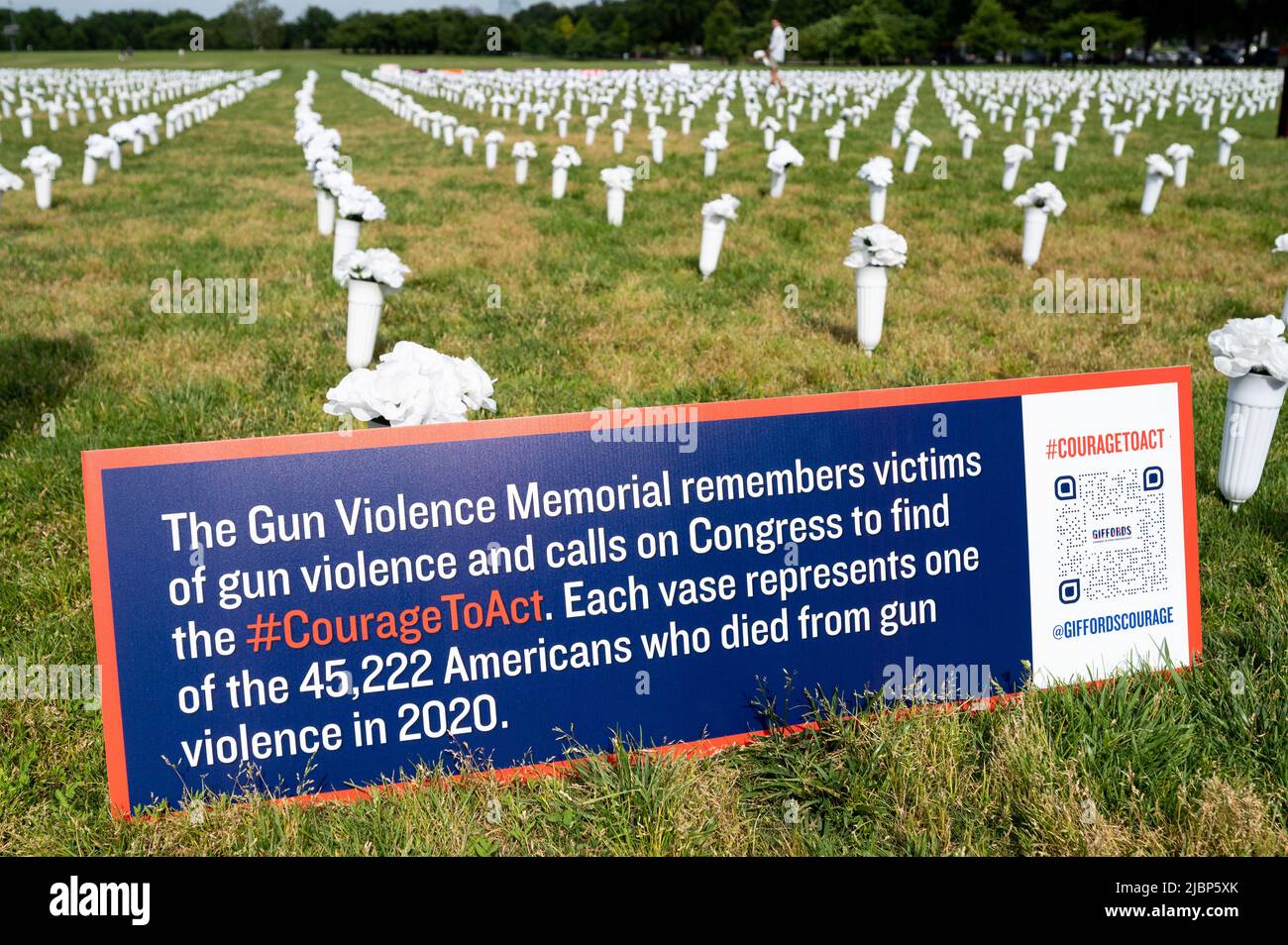 A sign saying "The Gun Violence Memorial remembers victims of gun ...