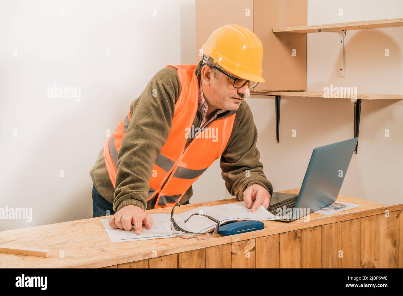 Contractor construction engineer reviewing the development of the work ...