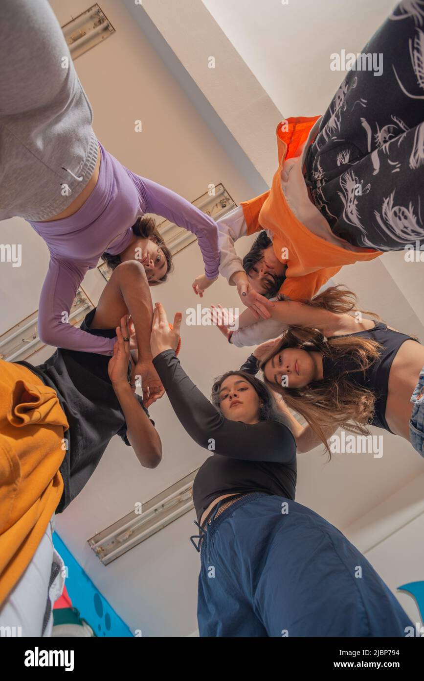 Group of hip hop dancers permorming their dance. Crew making show in an ...