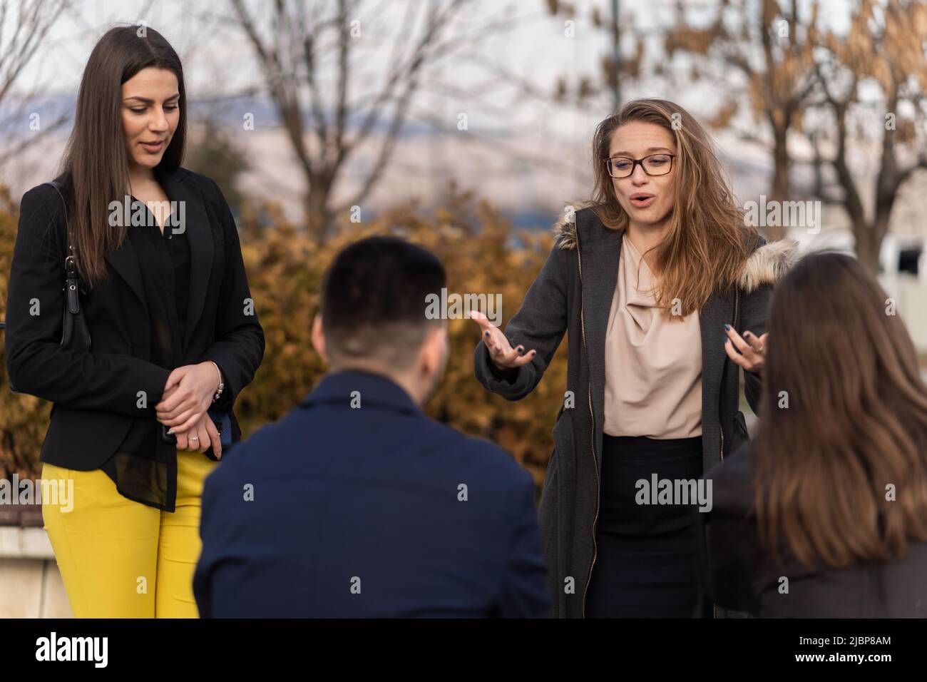 Group of young business people are having a discussion Stock Photo - Alamy