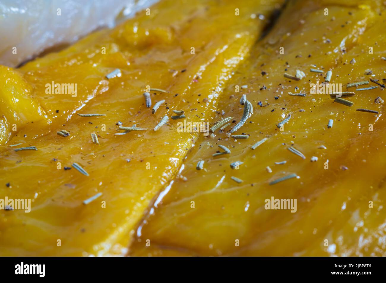 Raw seasoned fish fillets hi-res stock photography and images - Alamy
