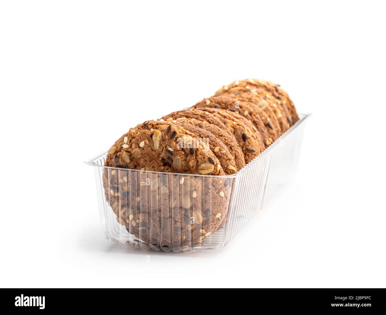 Healthy oatmeal cookies with different seeds in plastic pack isolated ...