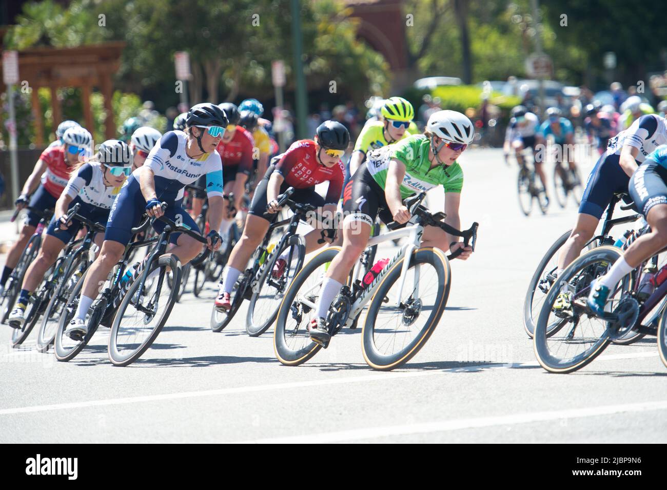 Women's peloton racing during the Redlands Classic Criterium in ...