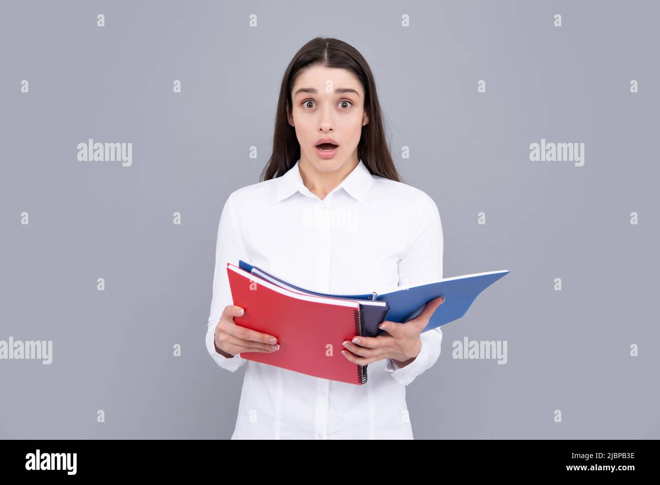 Charming student isolated on gray background. Woman high school student ...