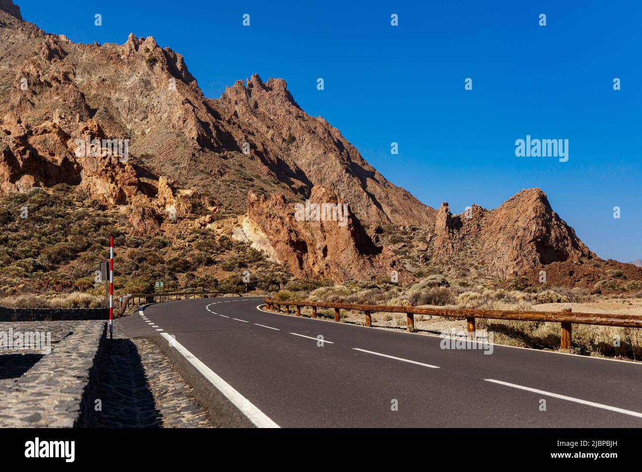 The scenic road through rocks and desert Stock Photo - Alamy