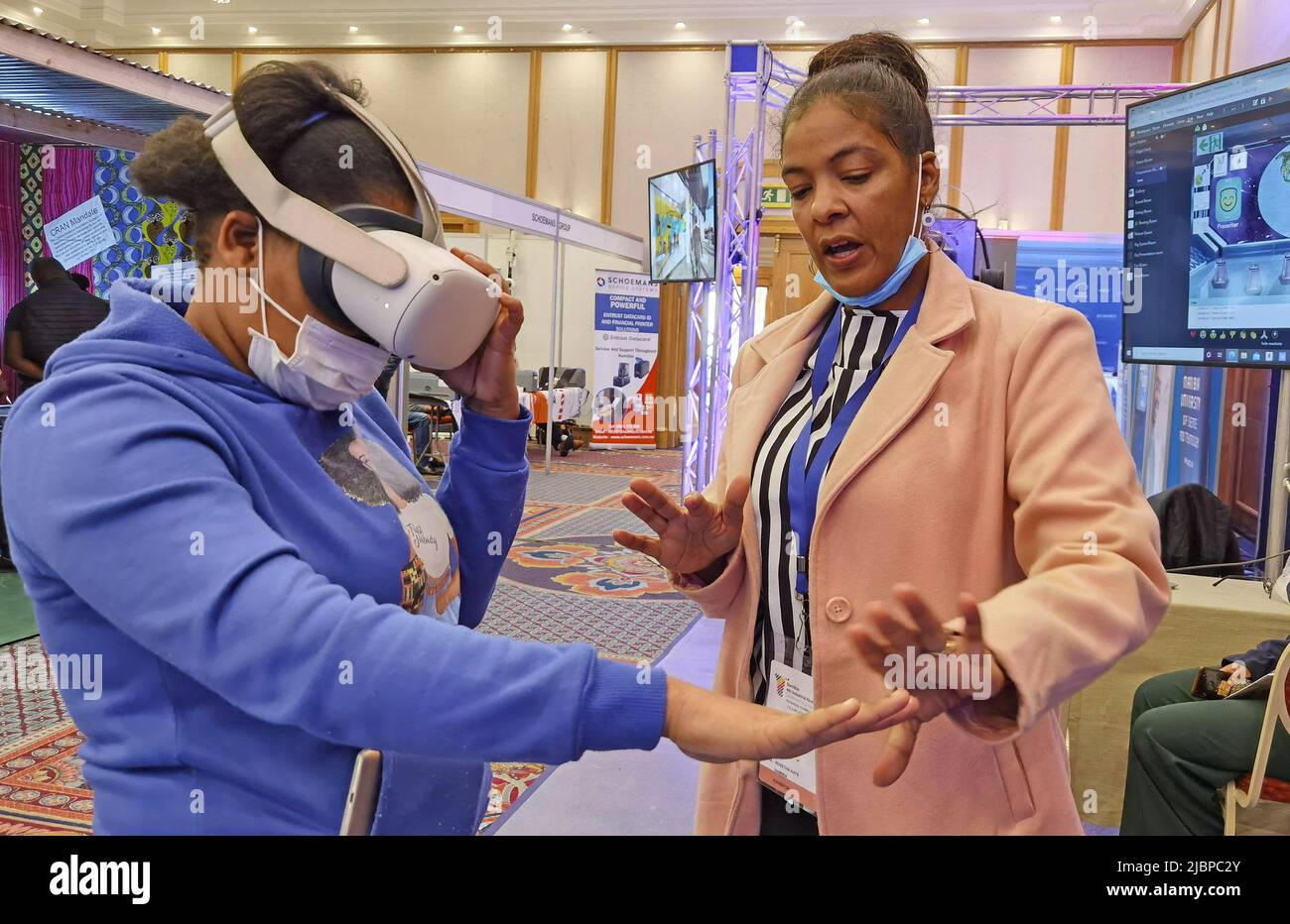 Windhoek, Namibia. 7th June, 2022. A visitor tries a virtual reality headset during the expo of ...