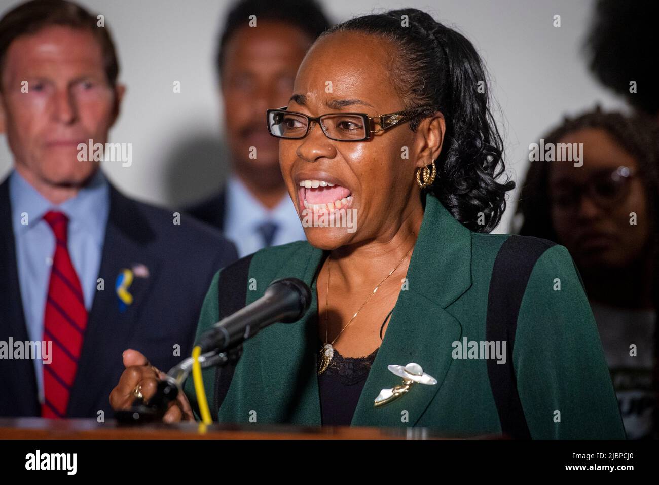 Kimberly Salter, left, wife of Tops Security Guard Aaron Salter, Jr ...