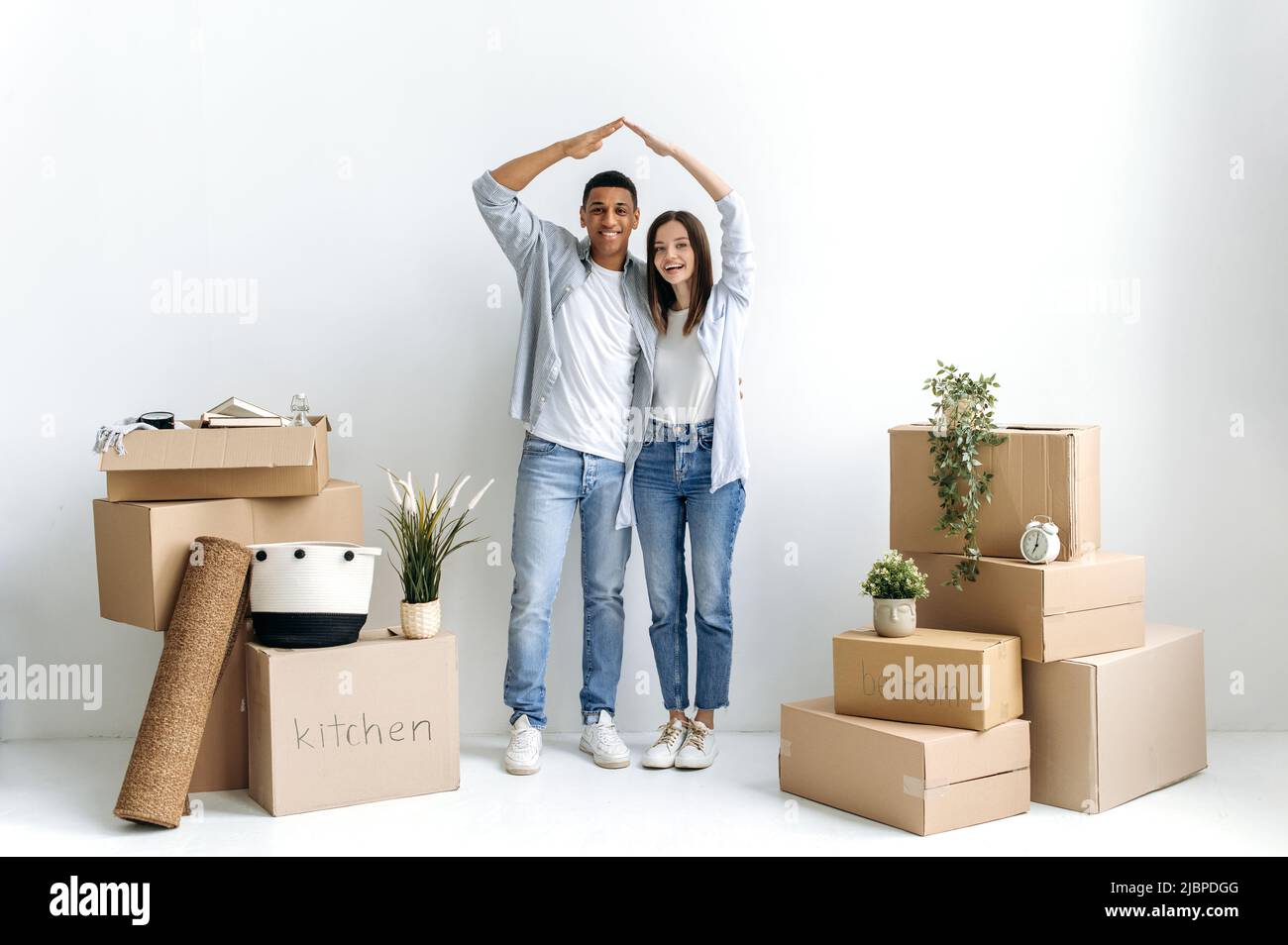 Young couple family boxes hi-res stock photography and images - Alamy