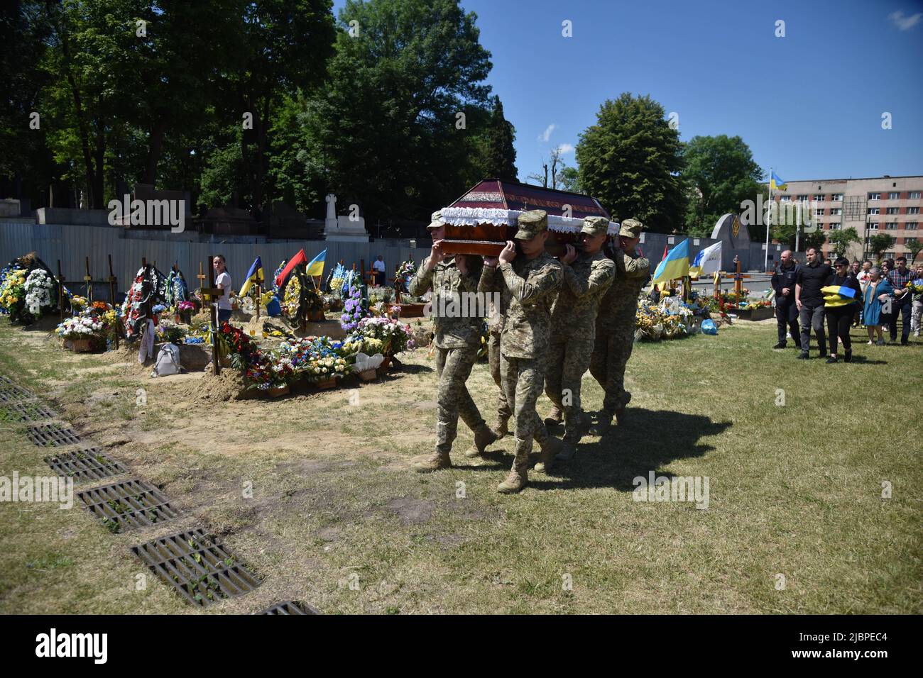 Lviv, Ukraine. 07th June, 2022. Ukrainian military carry the coffin with the body during the ...