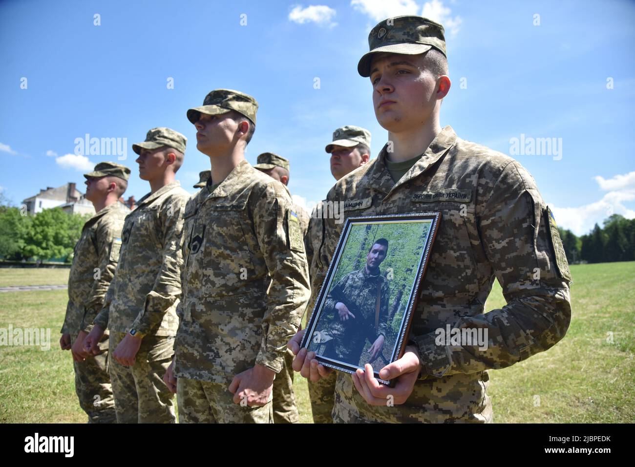 Lviv. Ukraine, 07 Jun 2022 A military man holds a portrait during the farewell ceremony of the ...