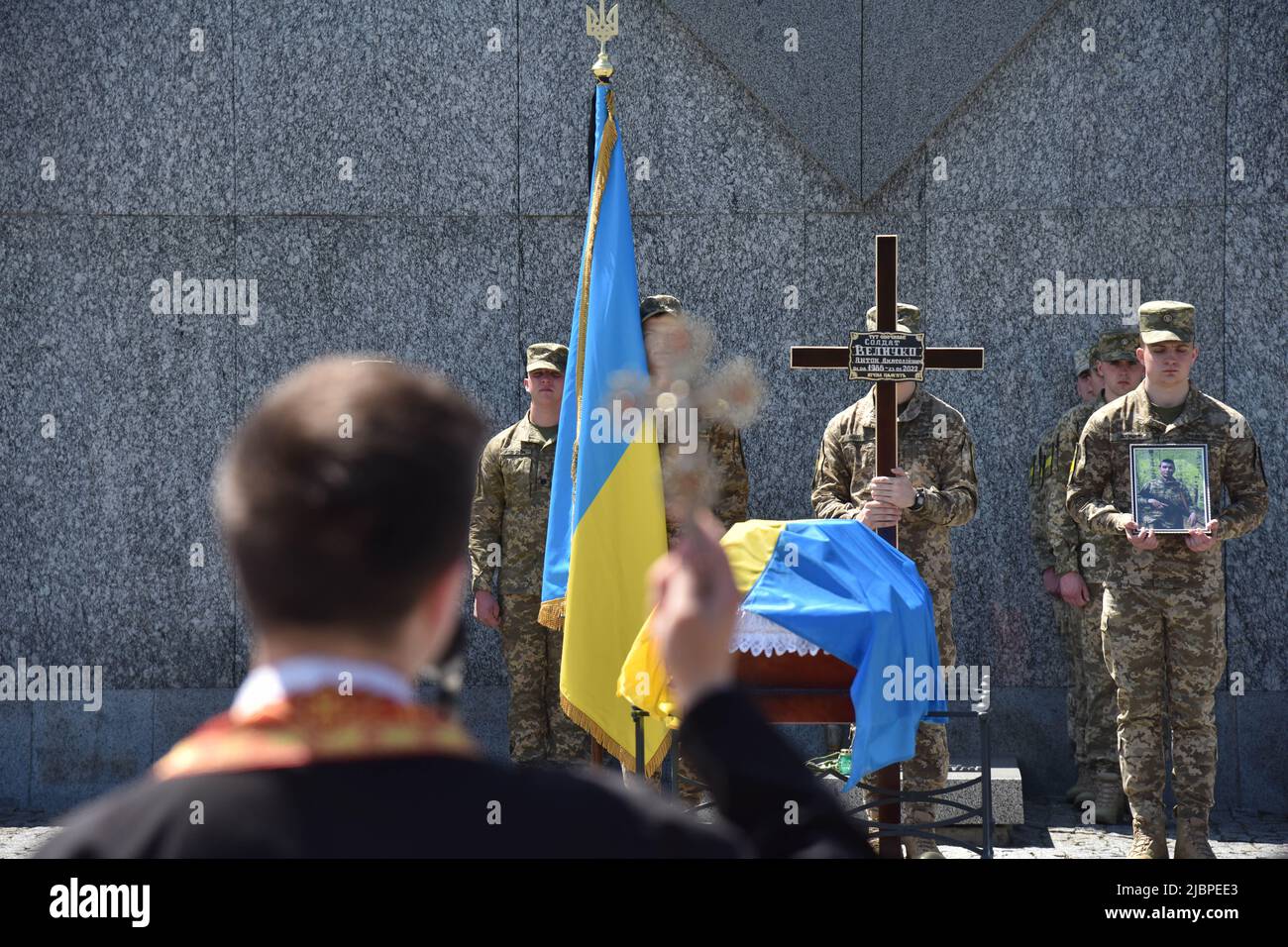 Lviv. Ukraine, 07 Jun 2022 Ukrainian military stand next to the coffin with the body during the ...