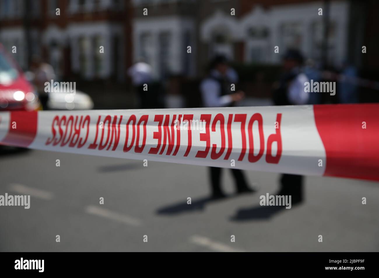A police tape around a crime scene Stock Photo - Alamy