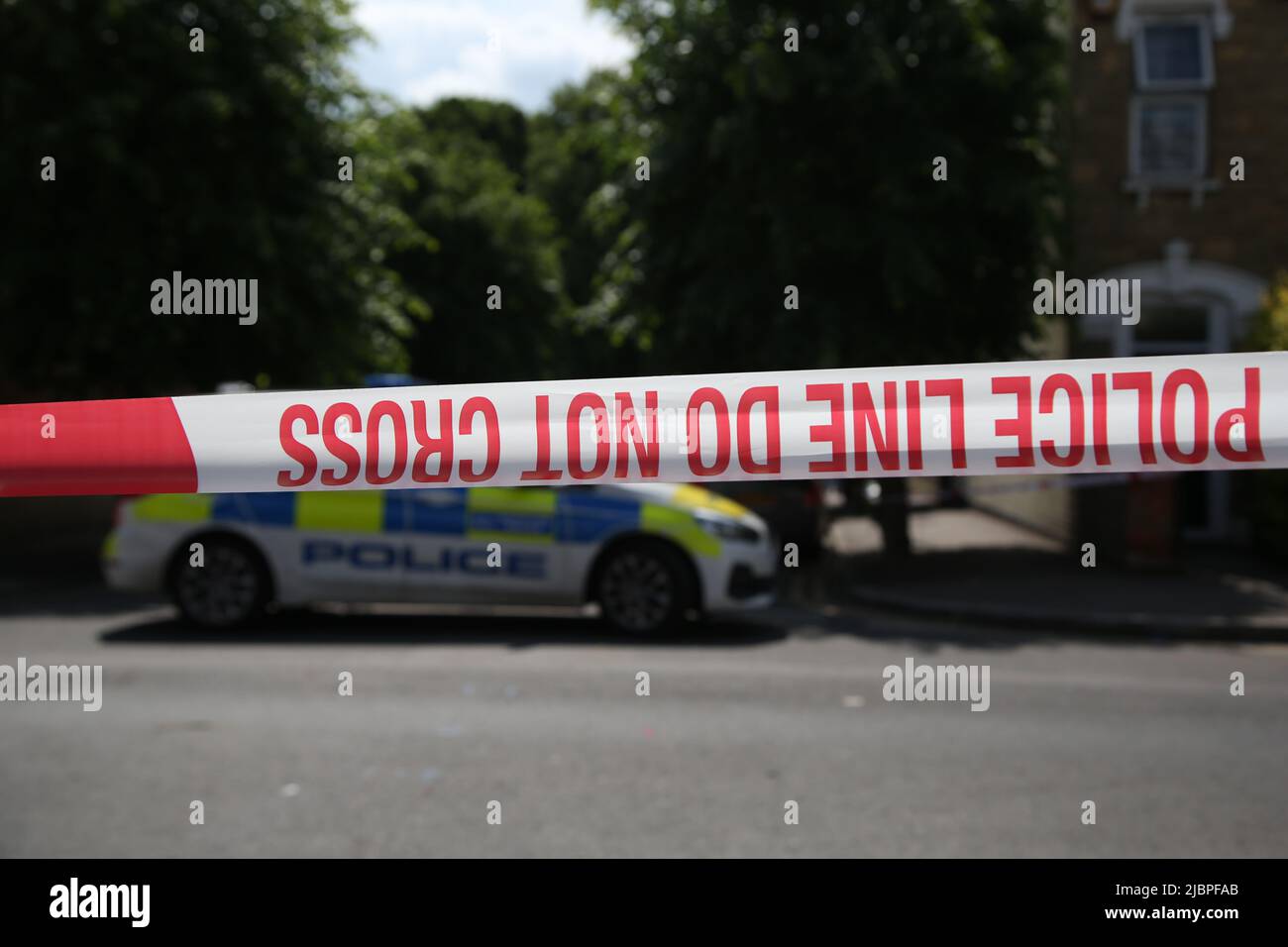 A police tape around a crime scene Stock Photo - Alamy